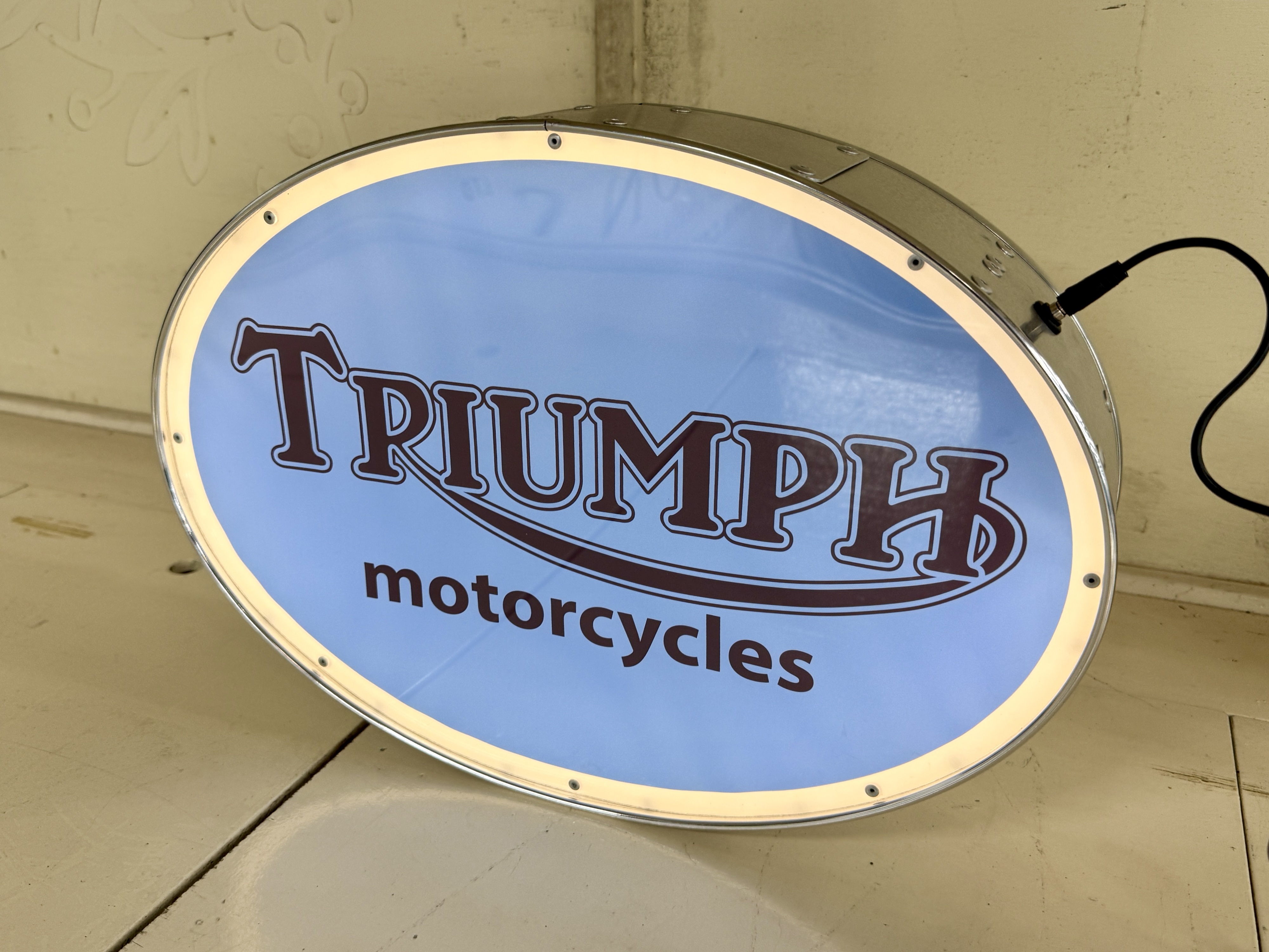 Lot 64 - Oval Illuminated Garage Sign - Triumph - NO